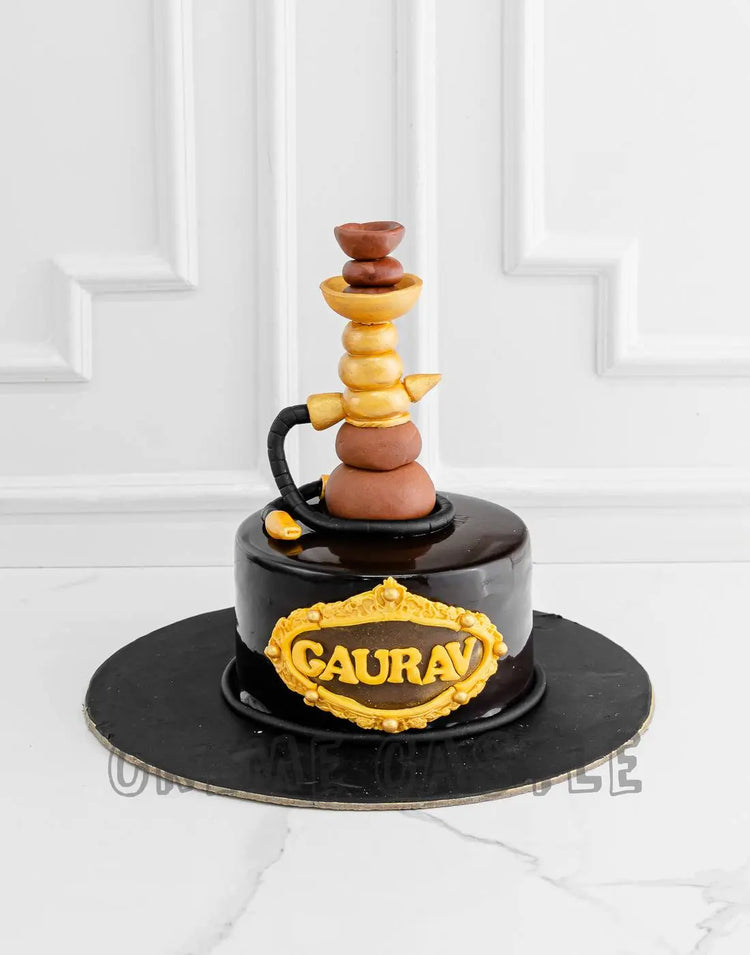 A beautiful hookah theme cake with a golden beaded hookah on top. A ...