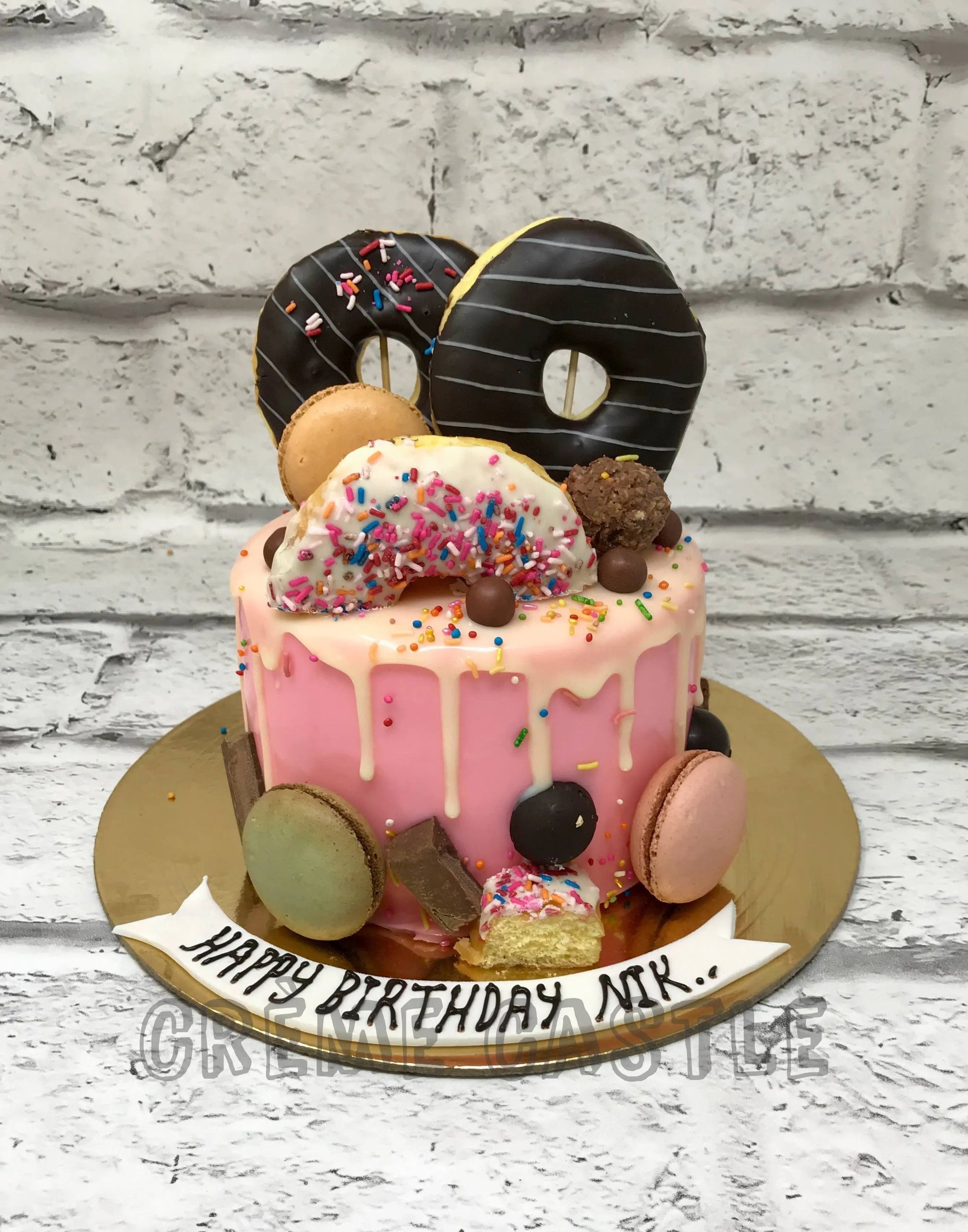 Donut Theme Cake by Creme Castle